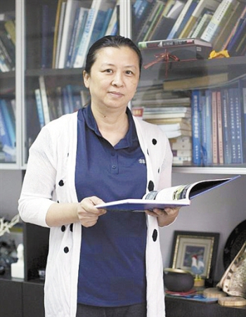 【科技日报】黄晖：我在海底种珊瑚----“中科院之声”电子杂志